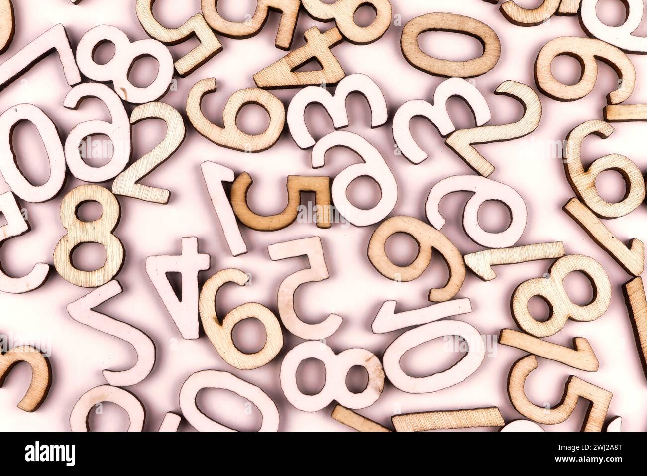 a collection of individual numbers lying isolated on a white background ...