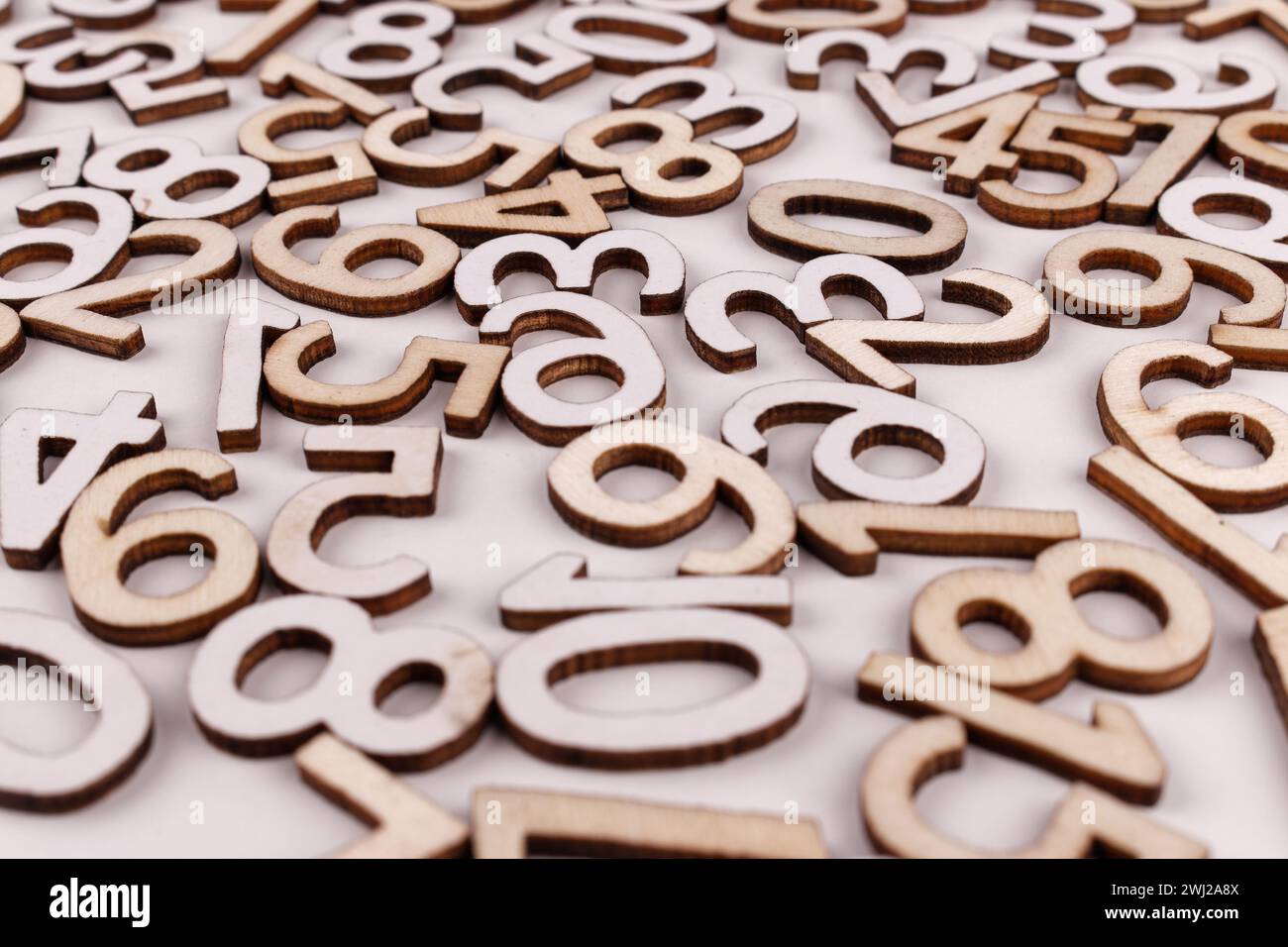 a collection of individual numbers lying isolated on a white background ...