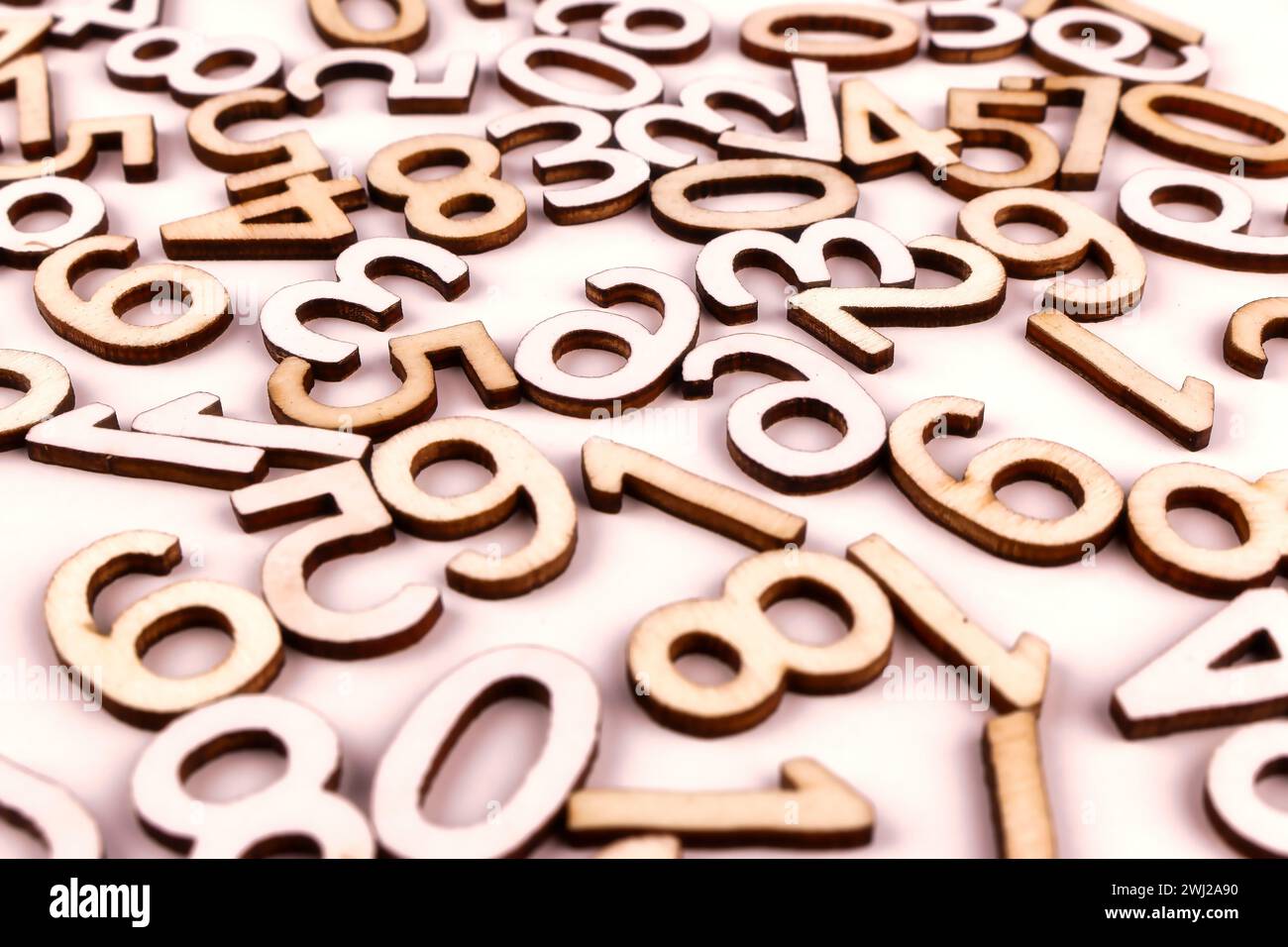 a collection of individual numbers lying isolated on a white background ...