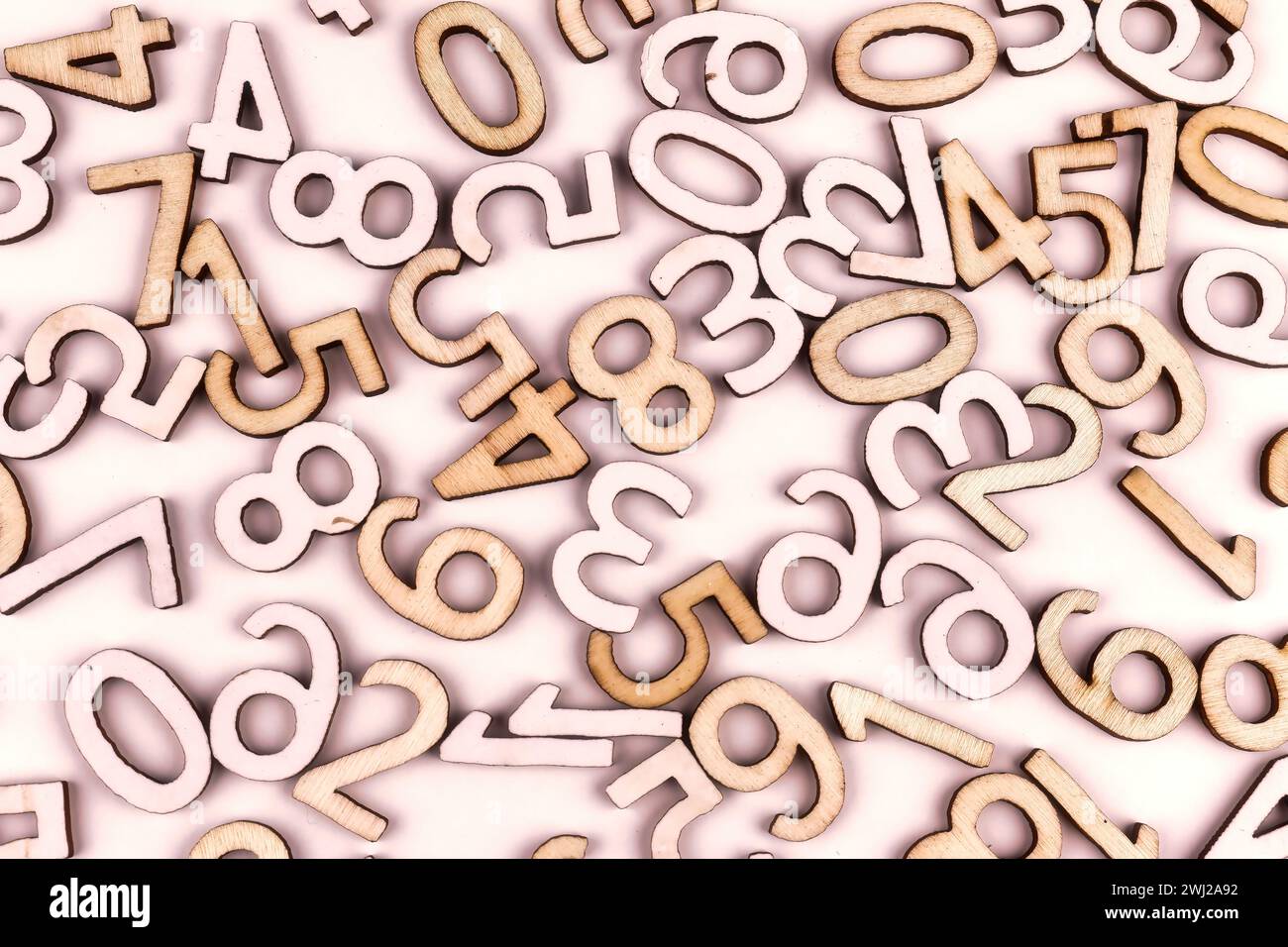 a collection of individual numbers lying isolated on a white background ...