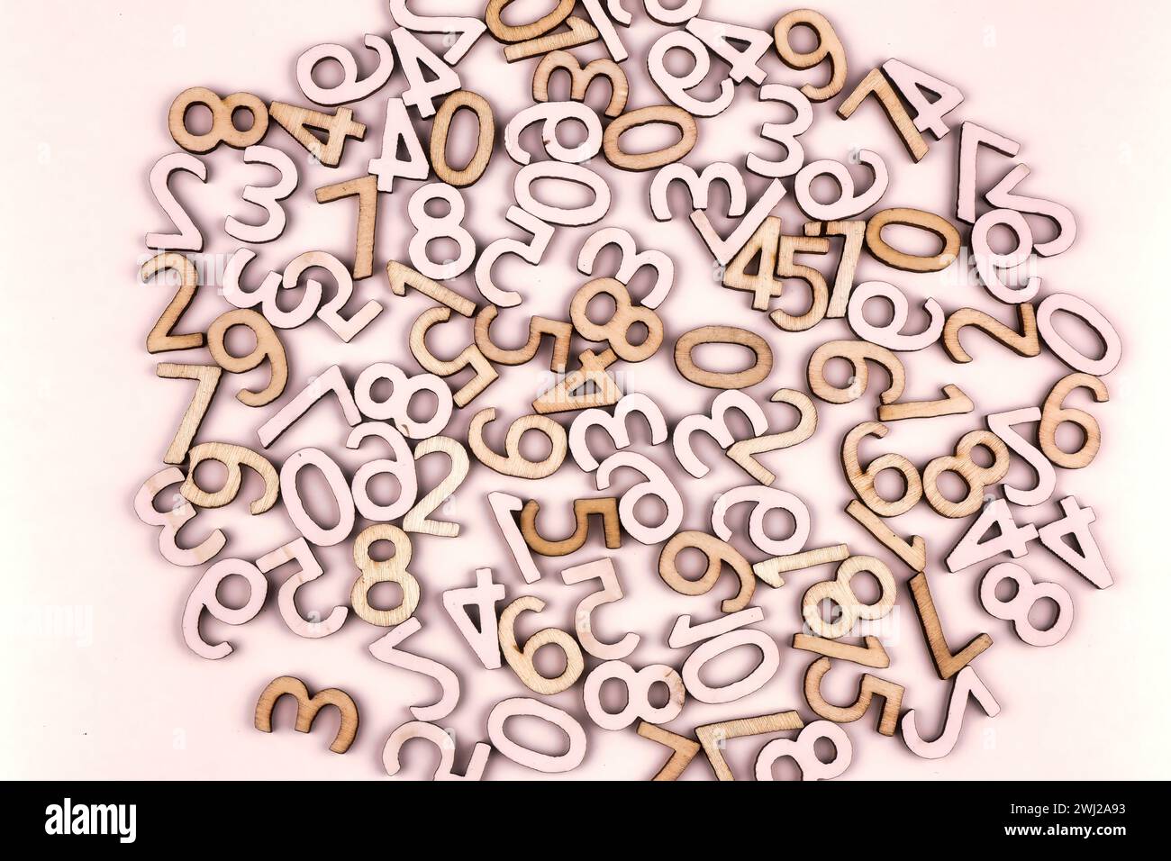 a collection of individual numbers lying isolated on a white background ...