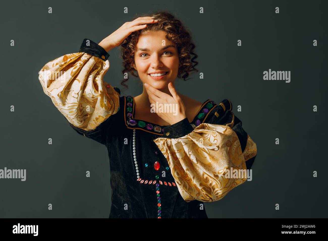 Portrait of a young aristocratic woman dressed in a medieval dress ...