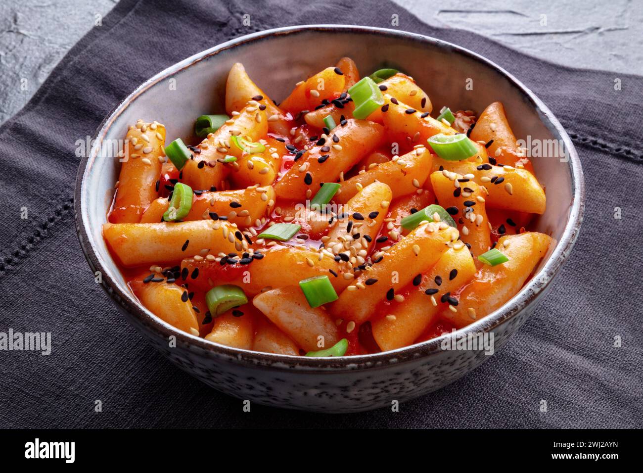 Tteokbokki or topokki, Korean street food, spicy rice cakes Stock Photo ...