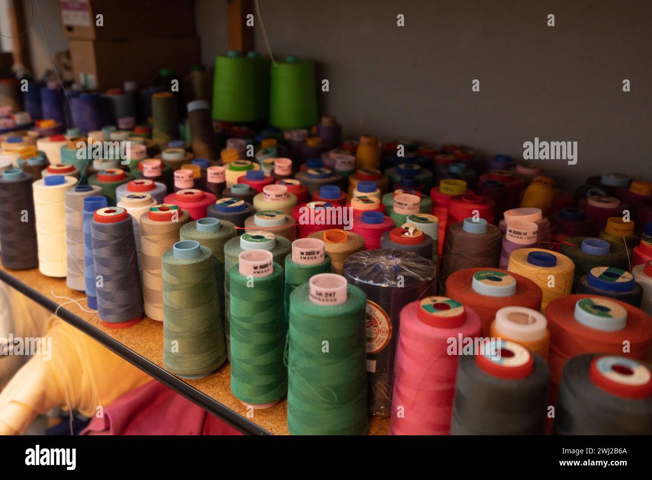 Bobbins colored thread industrial hi-res stock photography and images ...