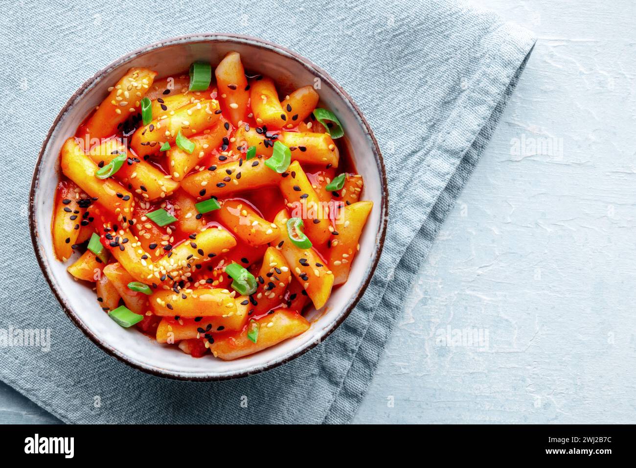 Tteokbokki or topokki, Korean street food, spicy rice cakes Stock Photo ...