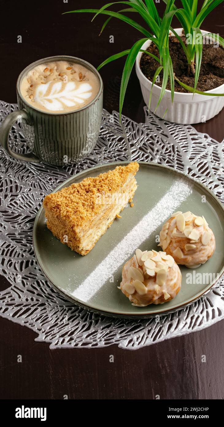 cappuccino in a mug and dessert on a plate. coffee shop menu Stock ...