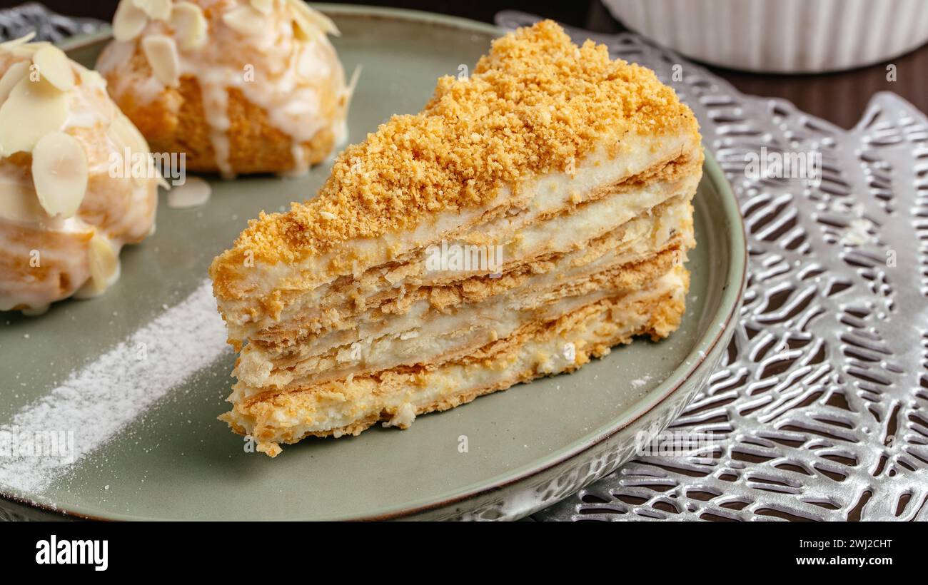 sponge cake dessert on a plate in a coffee shop on the table Stock ...