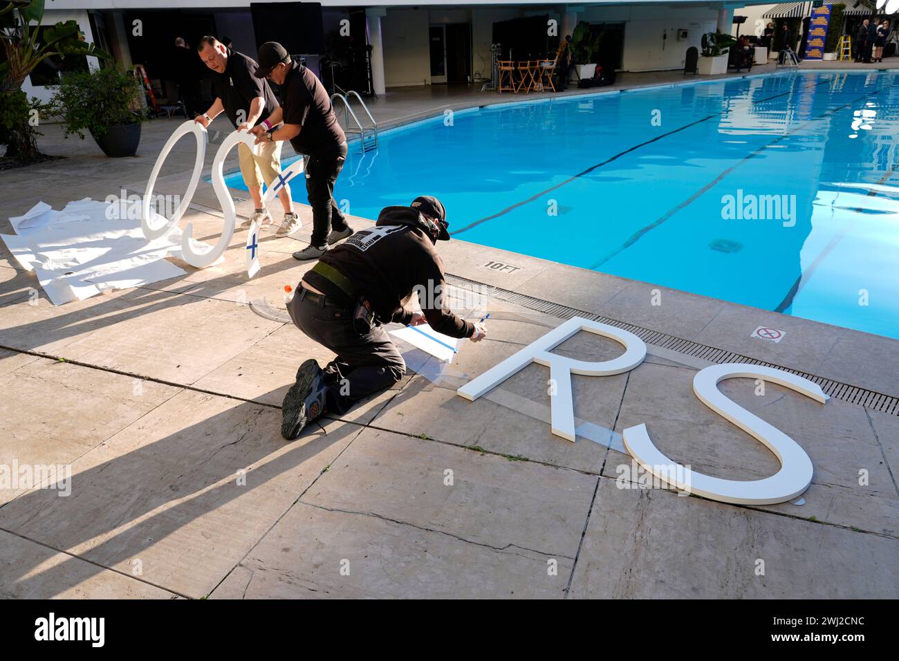 Workers set up Oscars signage during the 96th Academy Awards Oscar ...