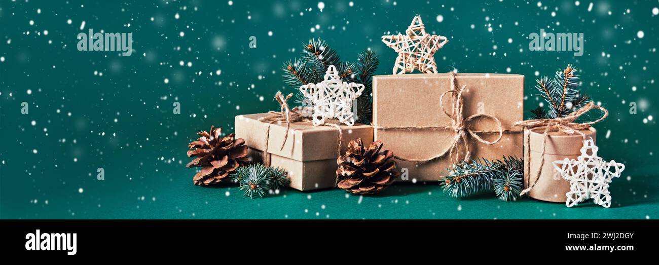 Christmas sustainable gift boxes composition and natural decor on snow ...