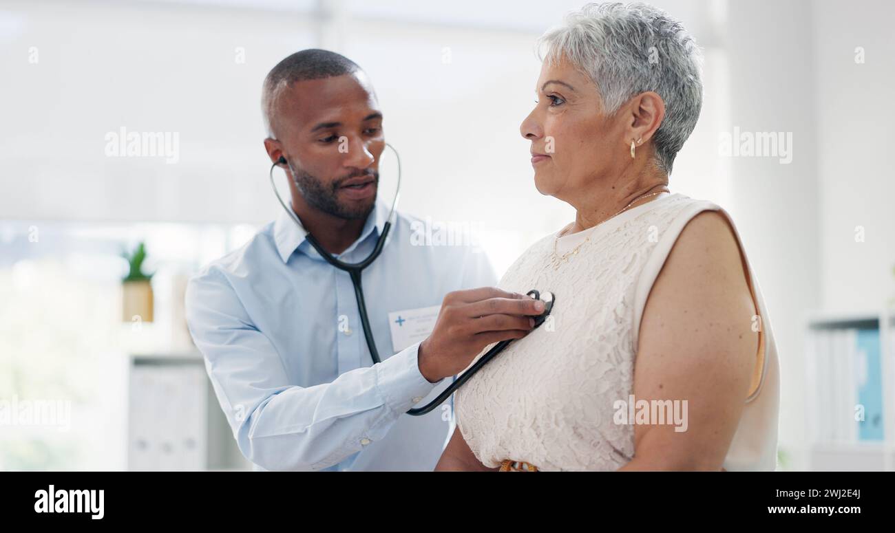 Stethoscope, examination and doctor with senior woman at hospital for ...