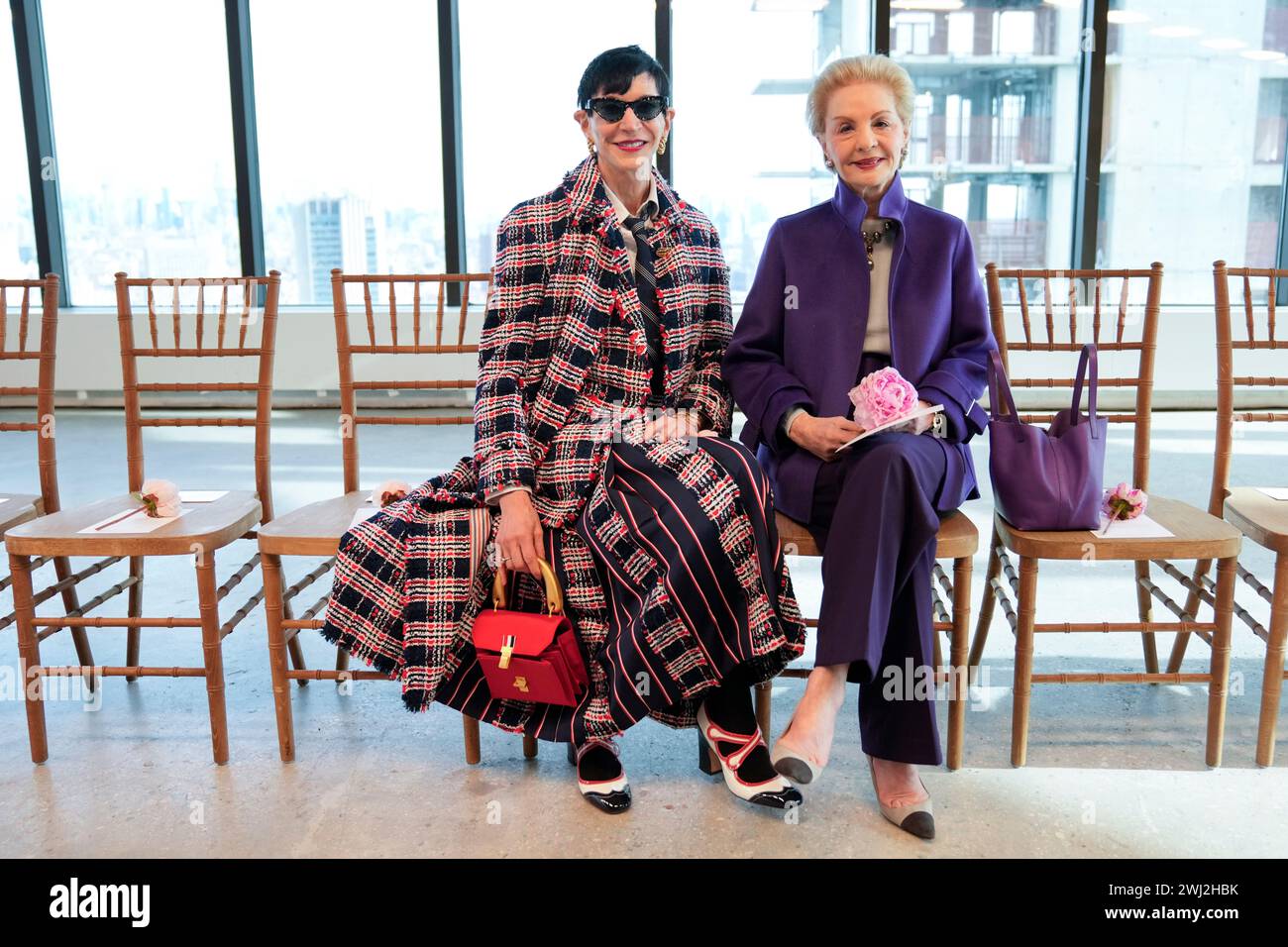 Designer Carolina Herrera, right, poses for photographers with ...