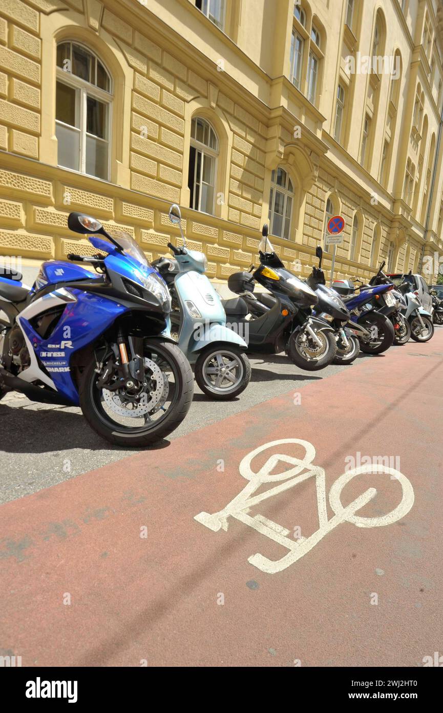 Motorcycle parking lot in road traffic Stock Photo - Alamy