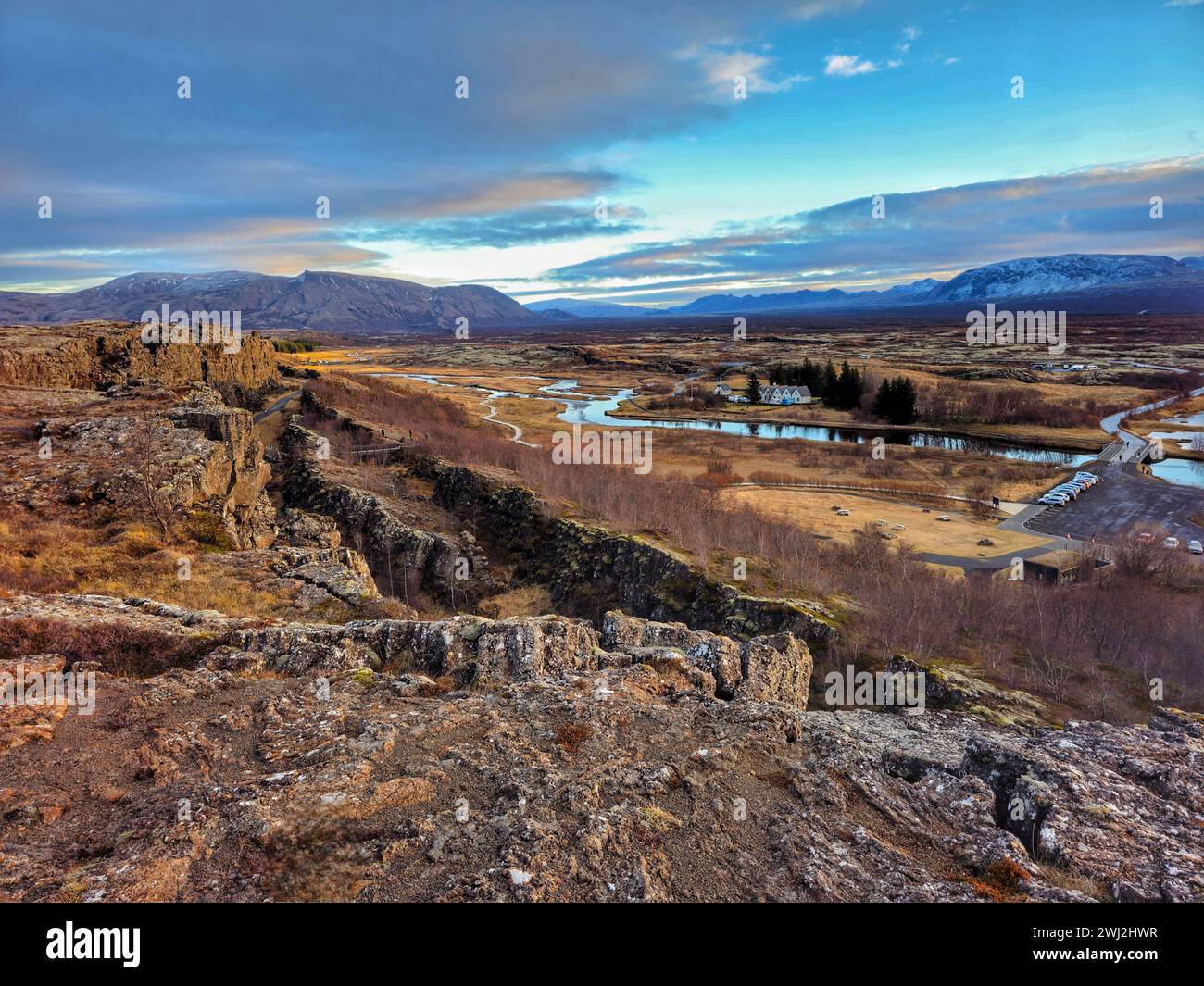 Scenic view of ancient stone pathway, lush grass, and majestic ...