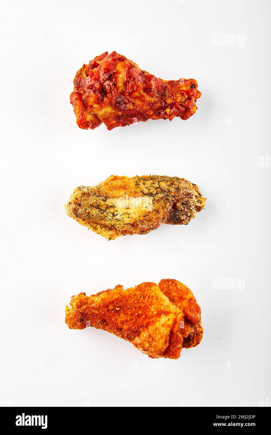 Deep fried Crispy chicken wings with different flavors and sauces on ...