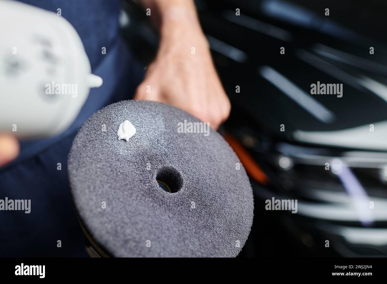 cropped view of devoted hard working serviceman in uniform applying ...