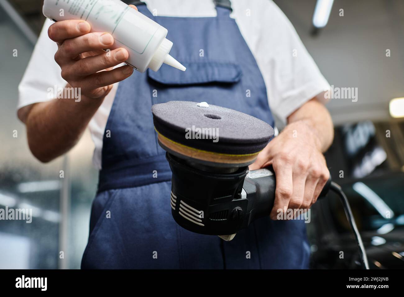 Professional caucasian car detailing worker hi-res stock photography ...