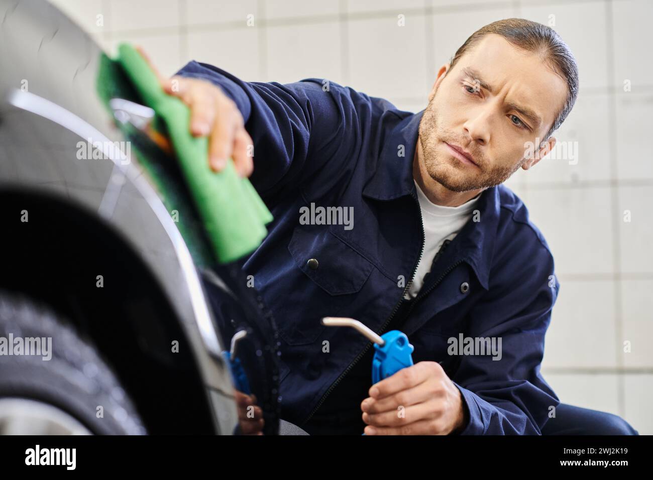 attractive dedicated professional with collected hair in uniform using ...