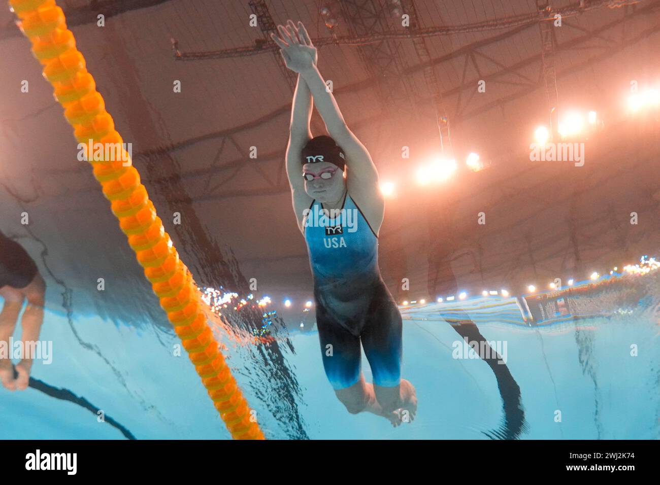 Claire Curzan of the United States competes in the women's 100-meter ...