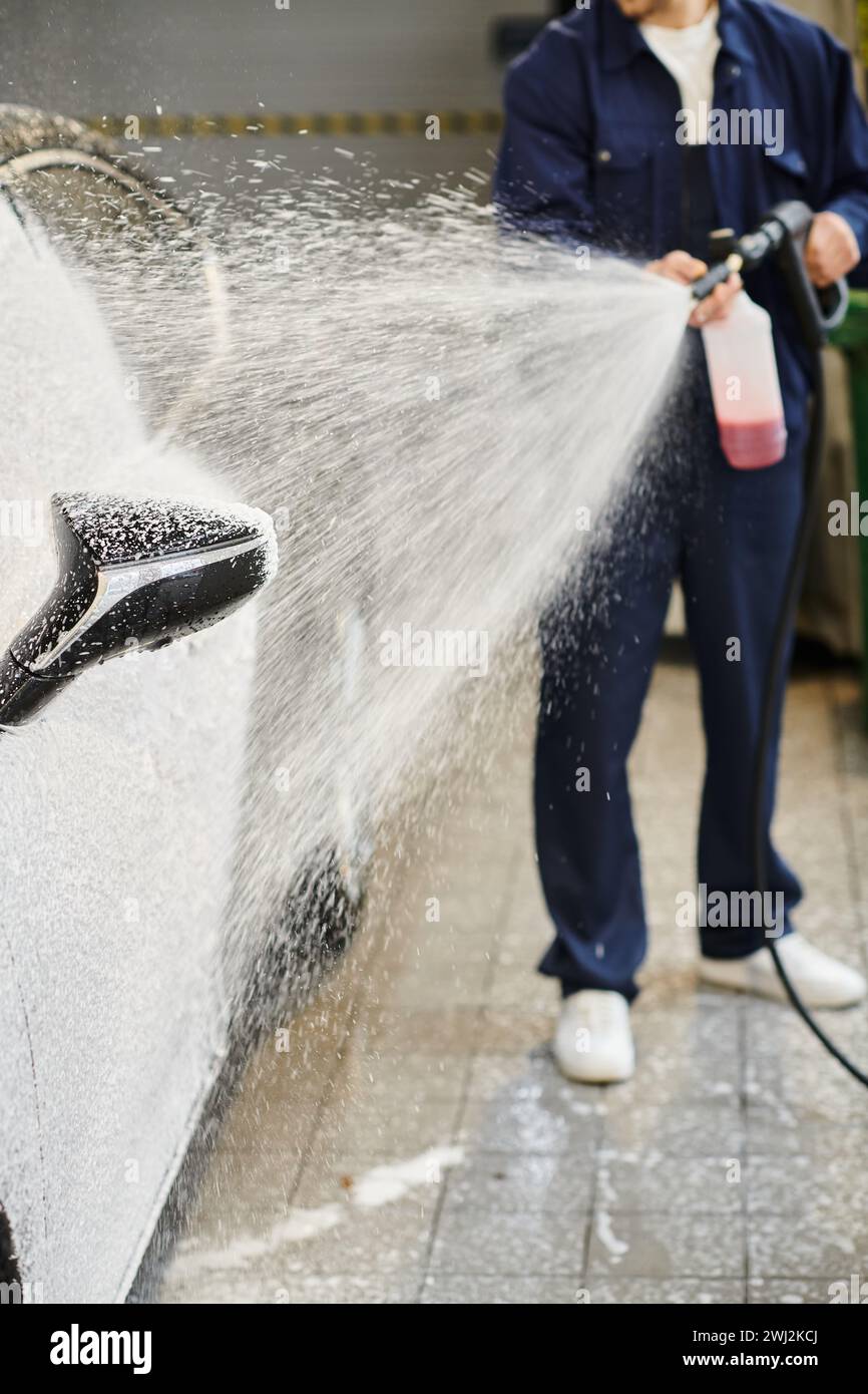 cropped view of dedicated hard working professional in uniform washing ...