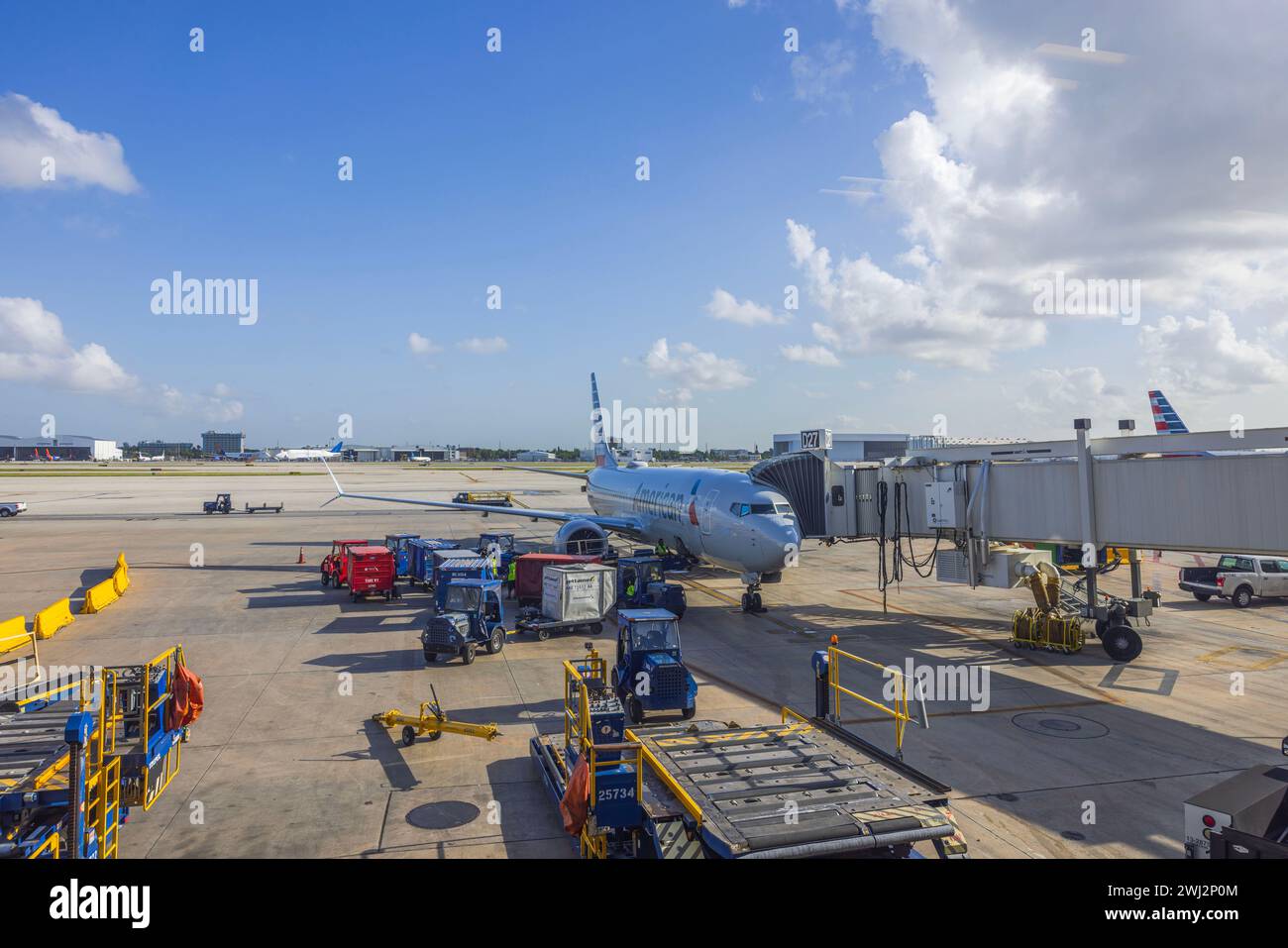 In Miami airport, there is a view of American Airlines plane connected ...