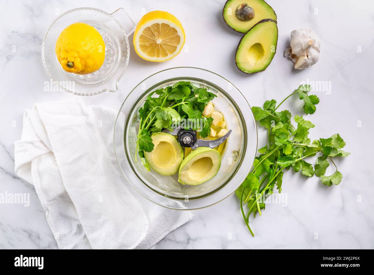 Preparing homemade avocado dressing or dip in food processor Stock ...