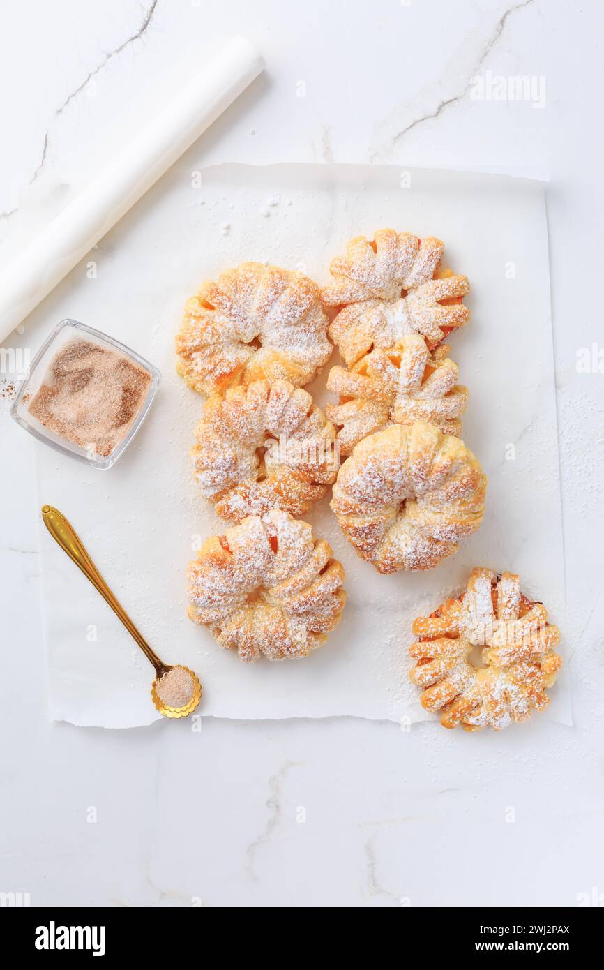 Homemade puff pastry apple rings, small healthy snack Stock Photo - Alamy