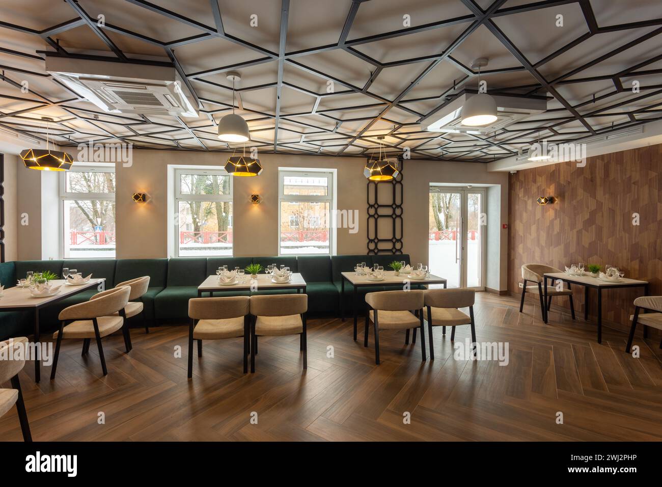 Modern interior of urban restaurant or cafe with dining places. Soft ...