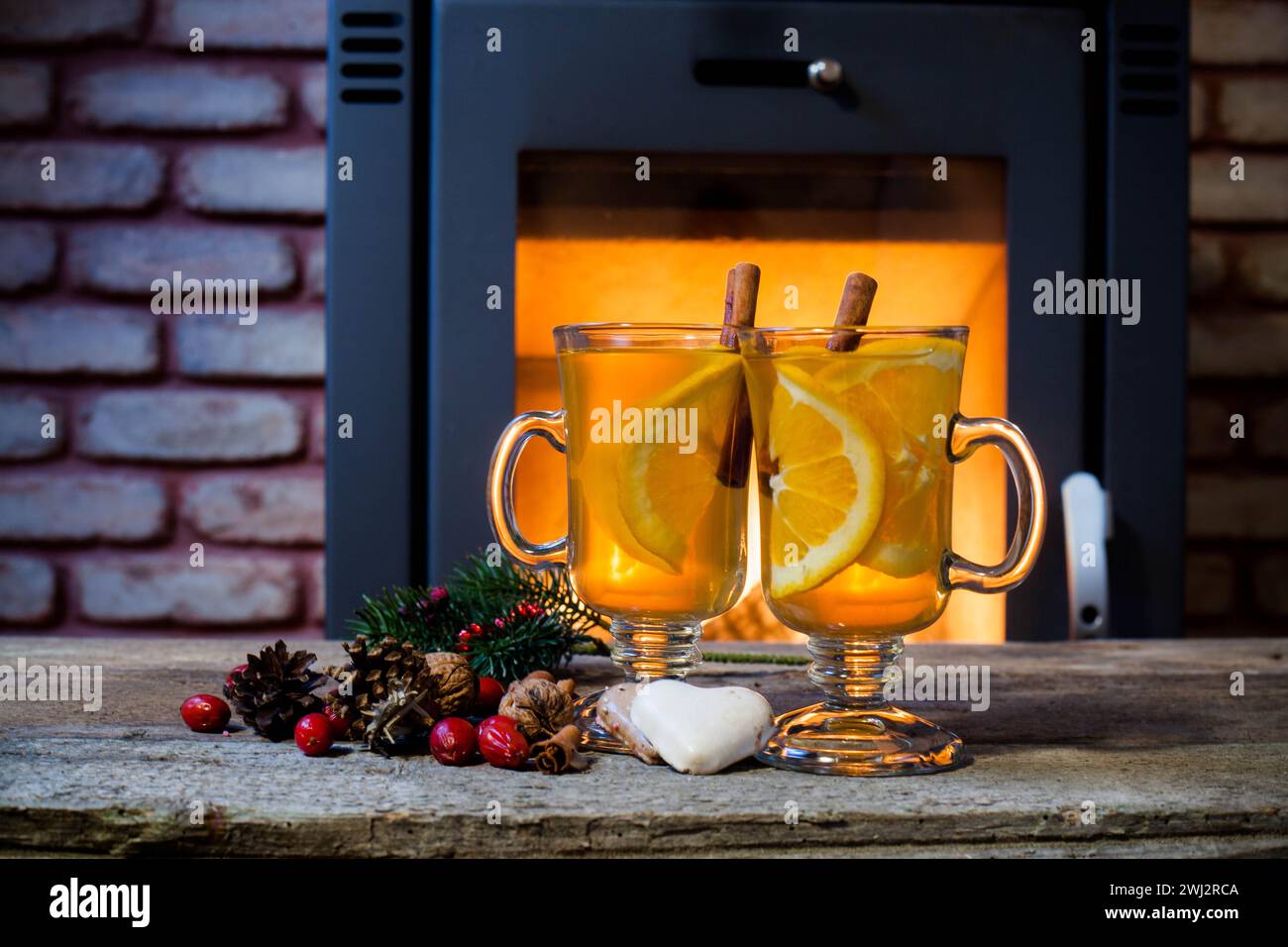 Woman winter wine fire hi-res stock photography and images - Alamy