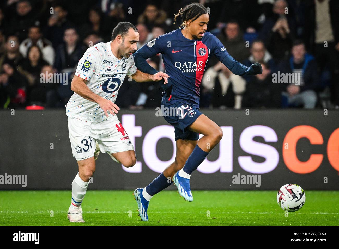 Ismaily GONCALVES DOS SANTOS of Lille and Bradley BARCOLA of PSG during ...