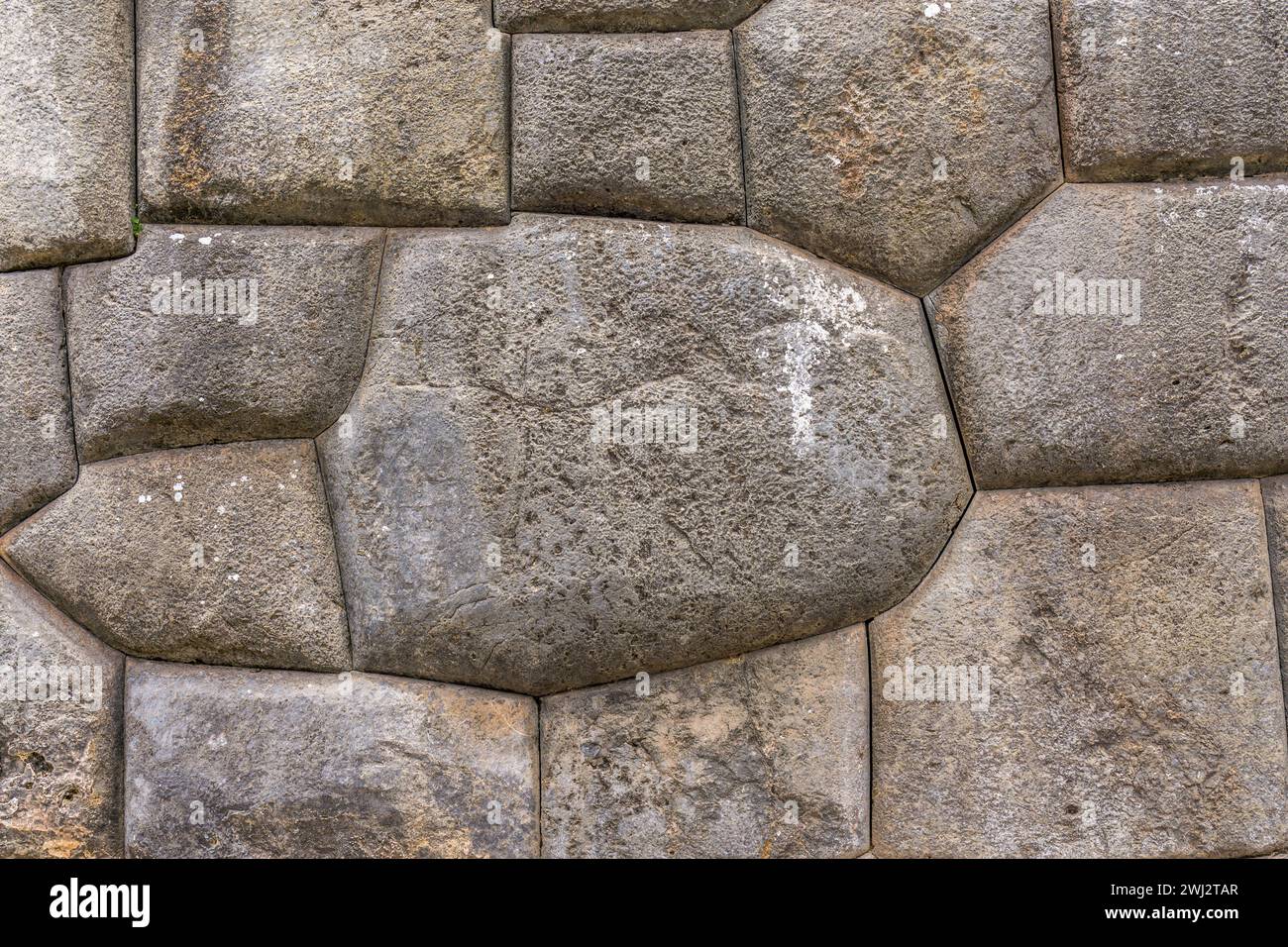 Stone wall constructed of huge boulders precisely carved by the inca's ...