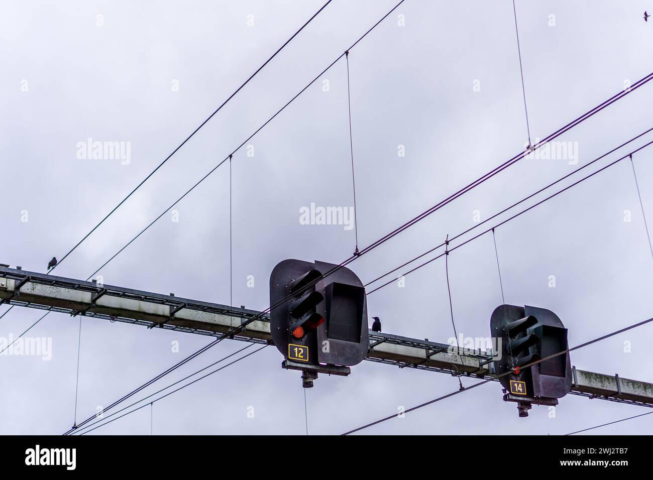 Overhead signals and high voltage cables on a portal as part of the ...