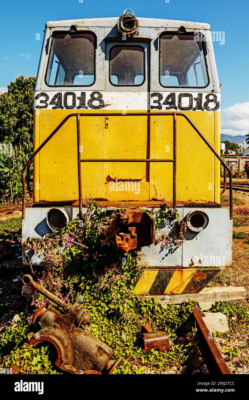 Old abandoned locomotive on a train yard Stock Photo - Alamy