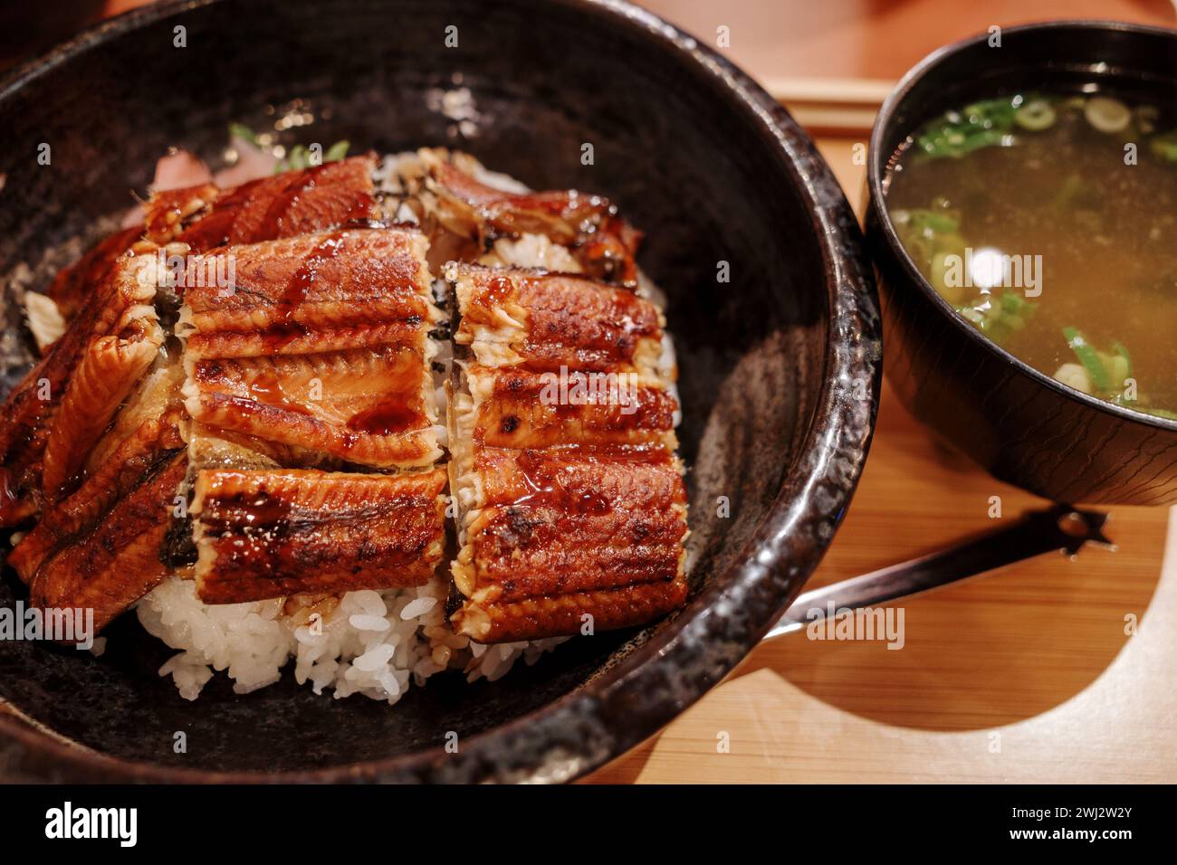 Unagi Don, Japanese grilled eel with teriyaki sauce serve with rice and Miso soup, on the ...