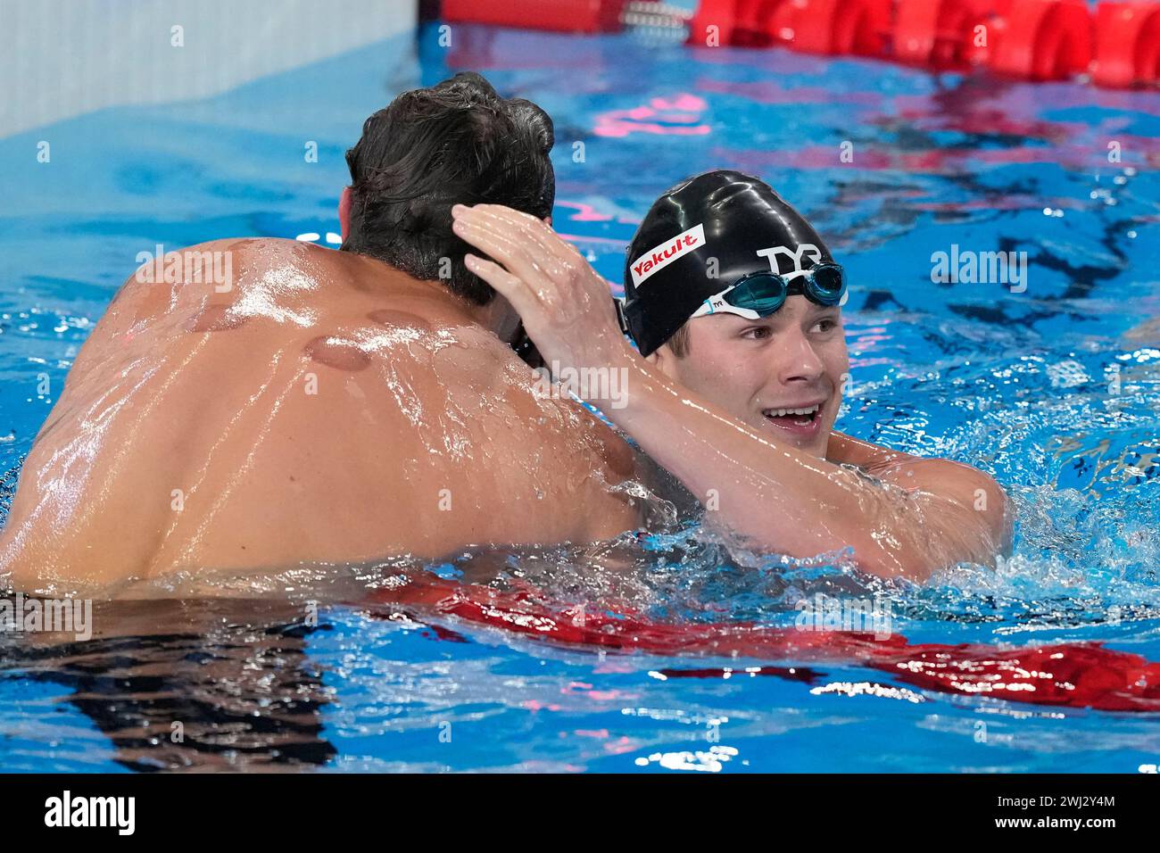 Nic Fink of the United States, right, celebrates with Nicolo ...