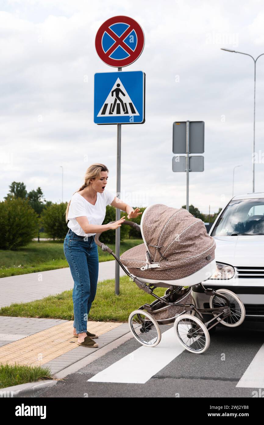 Mother on the crosswalk after a car accident when a vehicle hits her ...