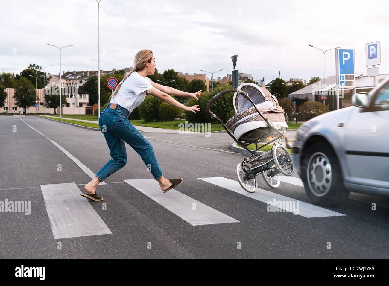 Car accident on the crosswalk. Vehicle hits the baby pram at high speed ...