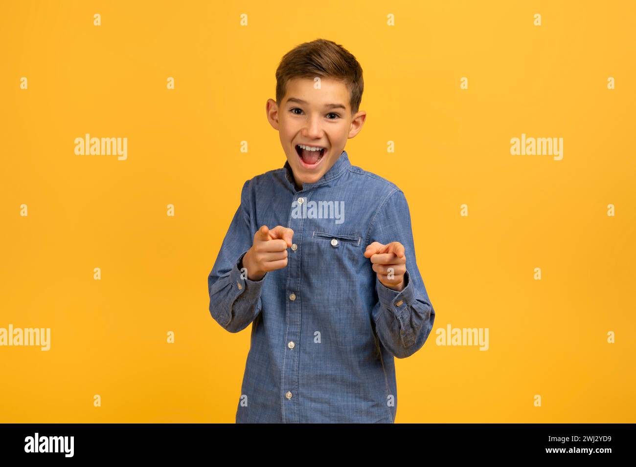 Portrait Of Cheerful Excited Teen Boy Pointing At Camera With Two Hands ...
