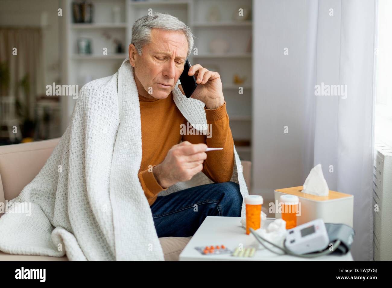 Sick elderly man have phone conversation with doctor Stock Photo - Alamy