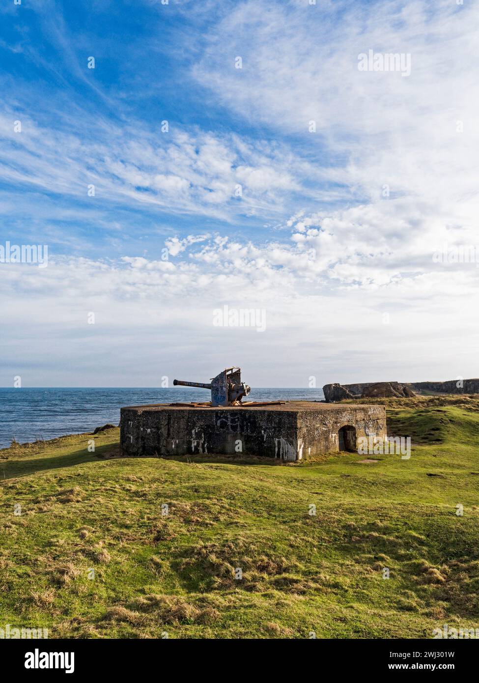 Replica of the disappearing gun at Trow Rock, South Shields, UK. The ...