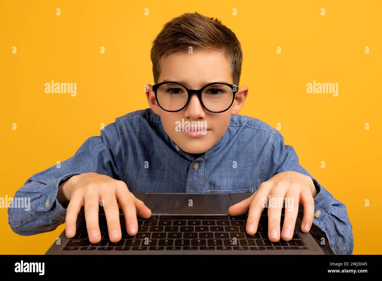 Nerdy kid glasses hi-res stock photography and images - Alamy