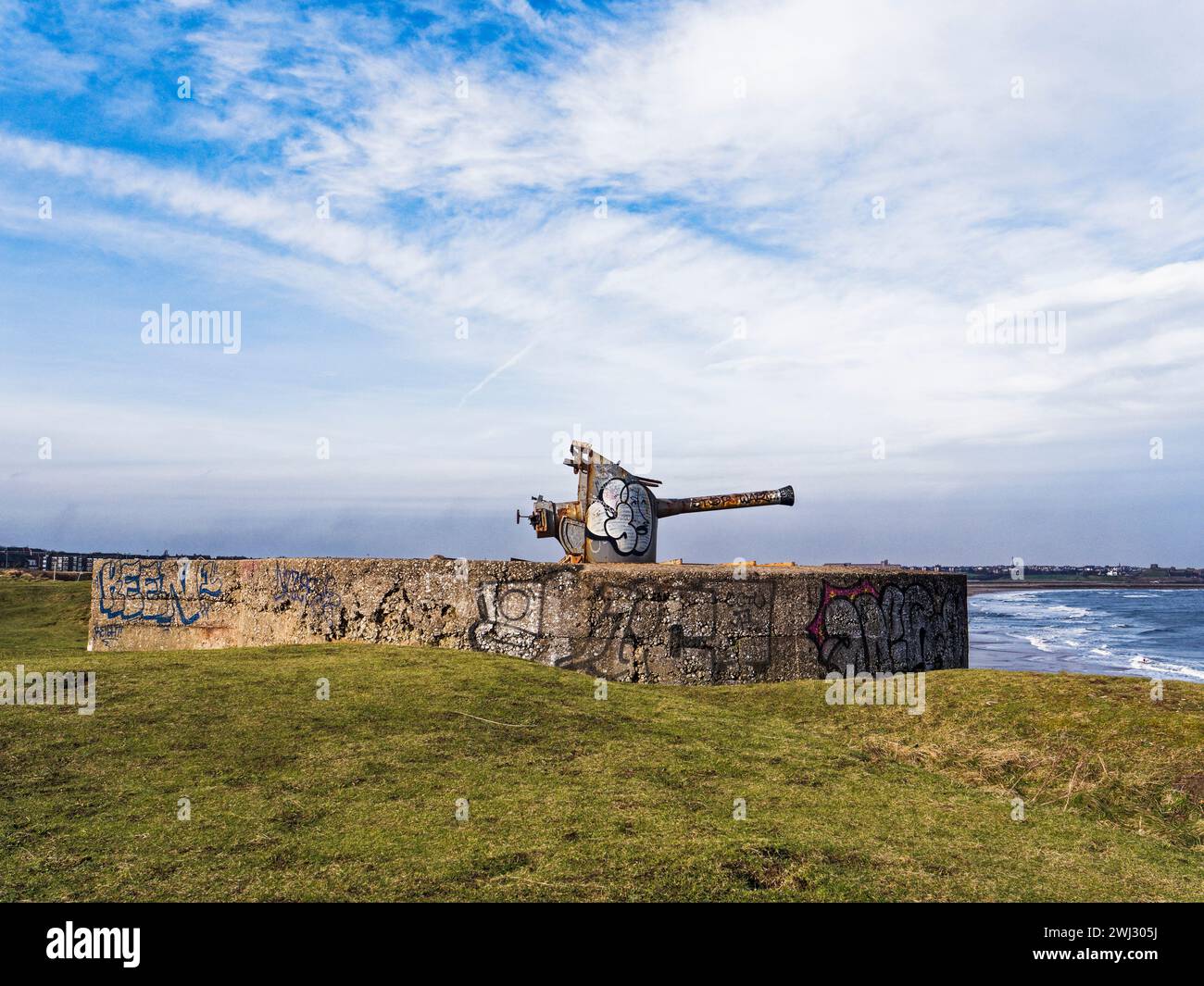 Replica of the disappearing gun at Trow Rock, South Shields, UK. The ...