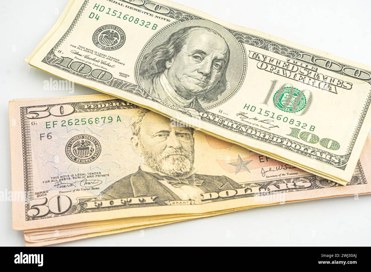 Bundles of hundred dollar bills hi-res stock photography and images - Alamy