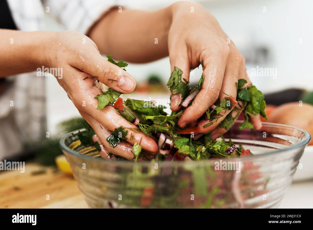 Hands mixing bowl hi-res stock photography and images - Alamy