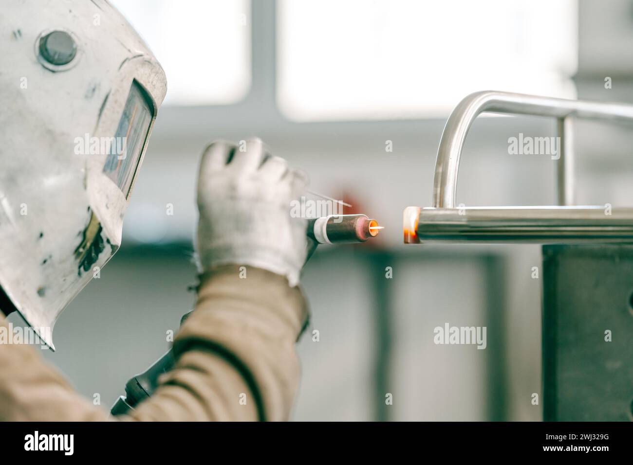 Closeup worker welding wearing hi-res stock photography and images - Alamy