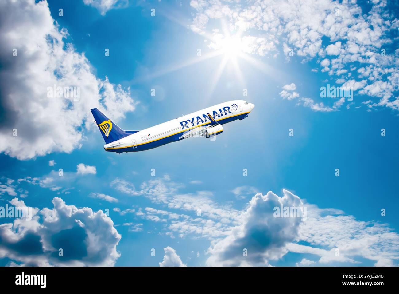 Bremen, Airport - August, 19, 2023. airplane flying in the sky. Ryan ...