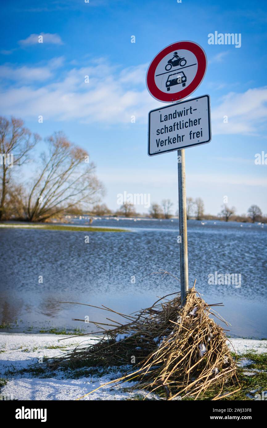 Traffic sign at the river Stock Photo - Alamy