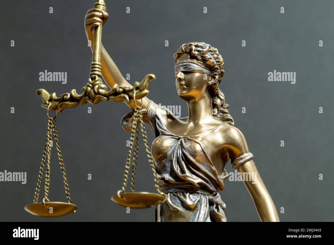 Statue of justice. Close-up Of Justice Lady Against gray Background ...