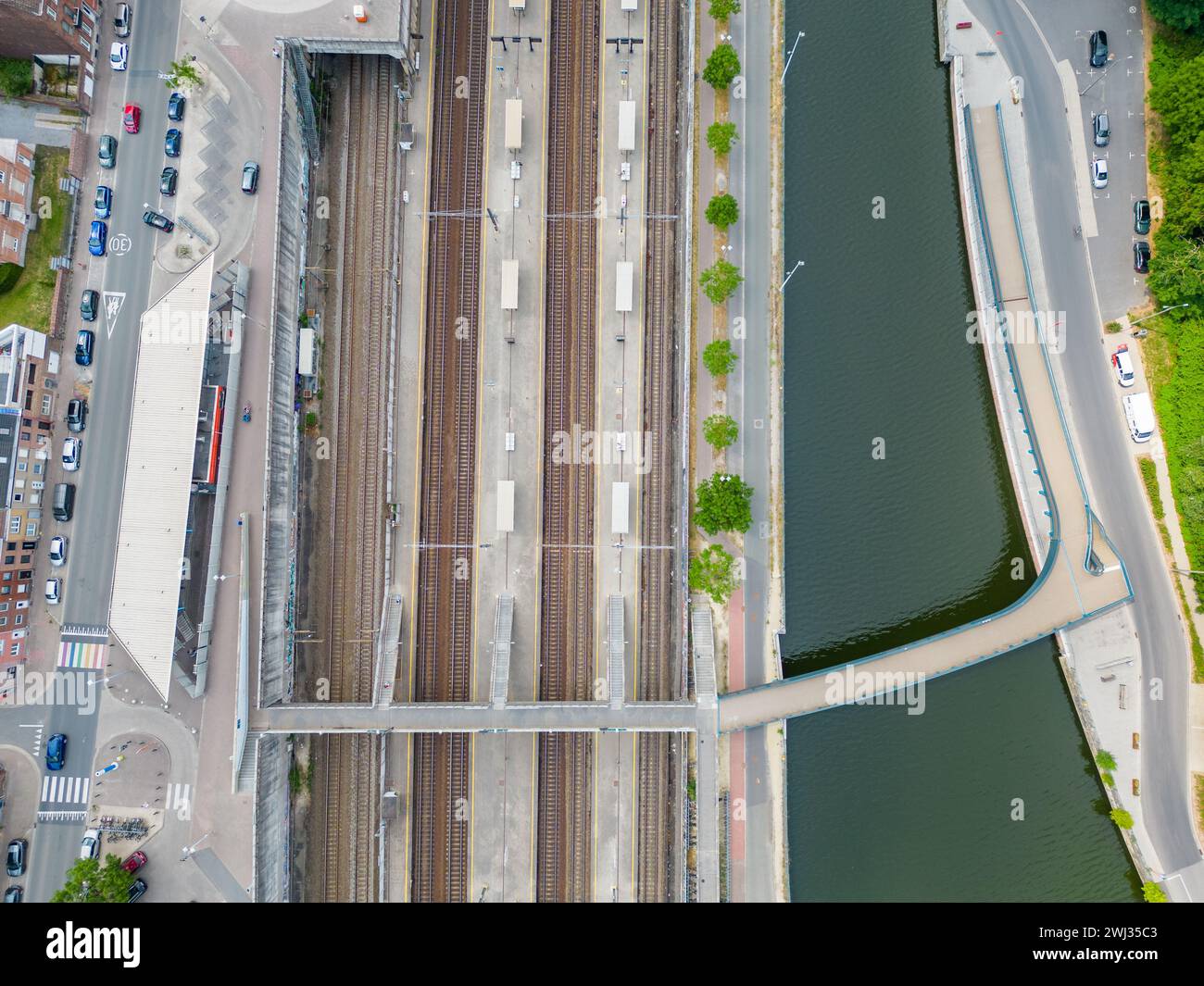 Confluence of Transit: Rail and River Stock Photo - Alamy