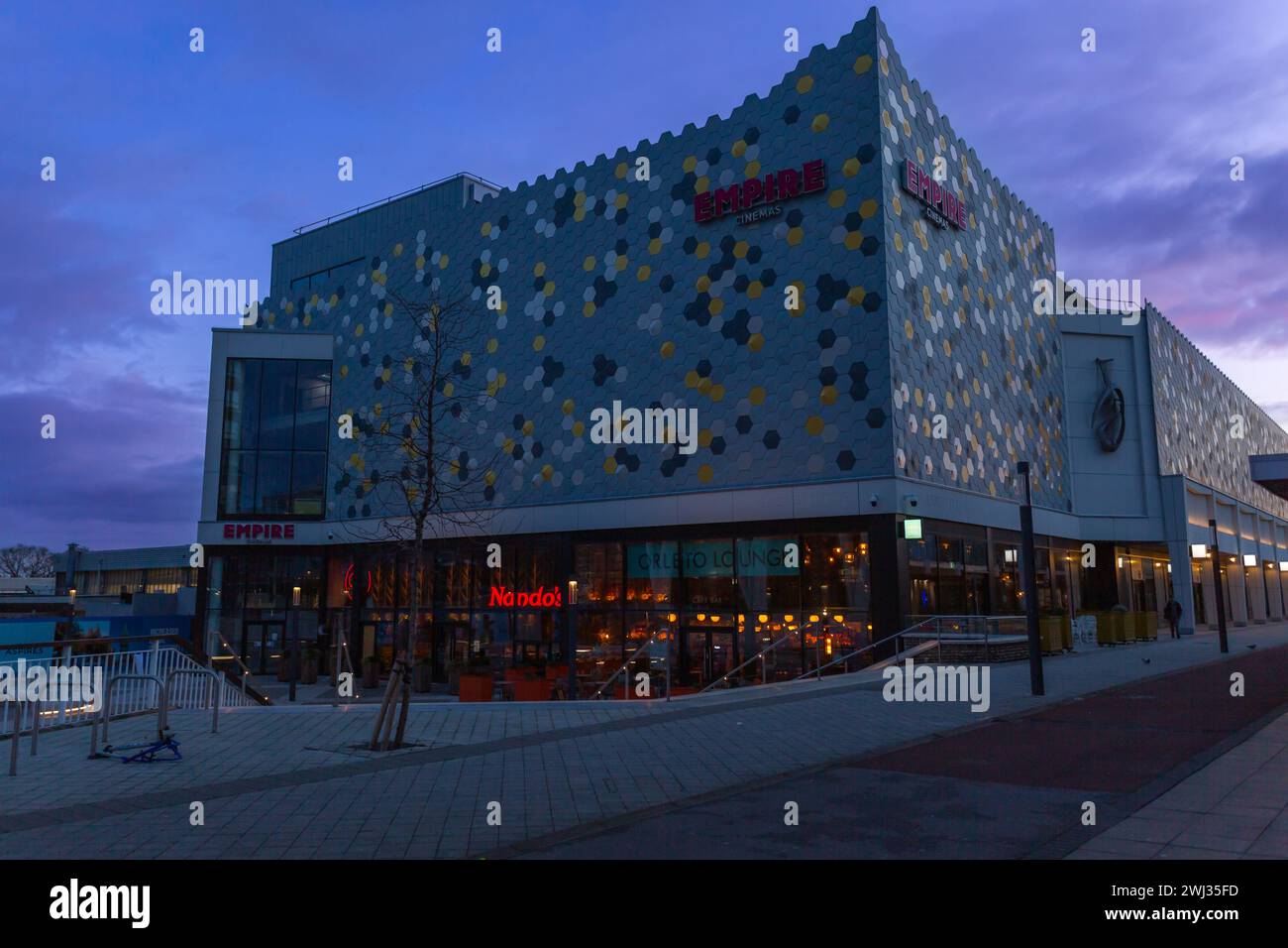 Dramatic early morning sky above the vacant Cinema Building complex ...