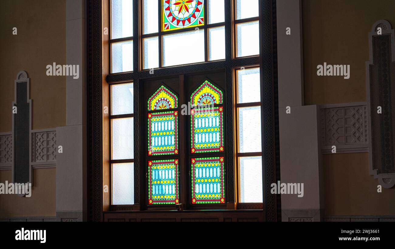 doha,qatar- february 02,2024: Sun light coming through the colorful ...